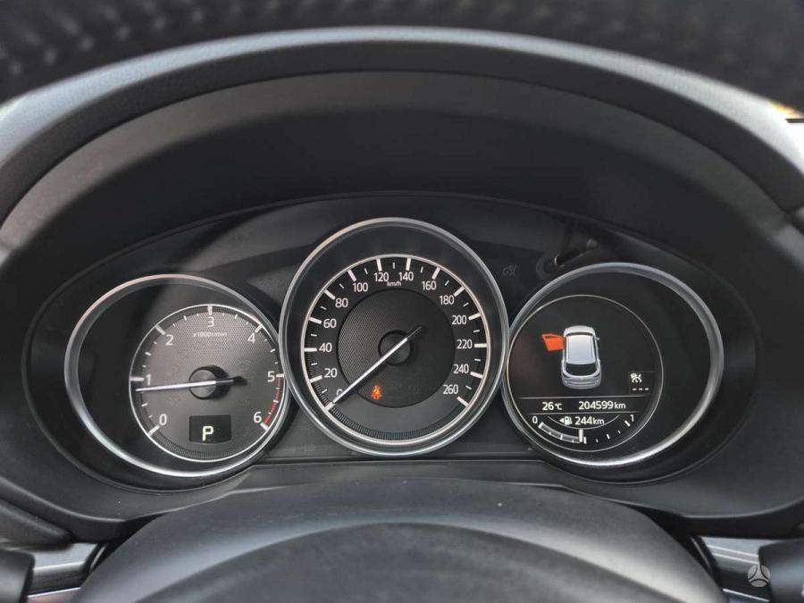 Red Mazda CX-5 2017 in Utena, with an engine capacity of 2.19 L and mileage of 205 thousand km for 13490 €, photo 17 on AUTOMOTO.COM.LV