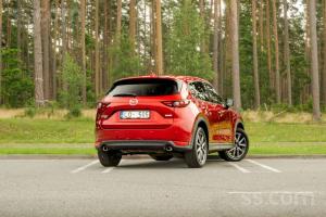 Red Mazda CX-5 2017 in Riga, with an engine capacity of 2.20 L and mileage of 193 thousand km for 15990 €, photo 7 on AUTOMOTO.COM.LV