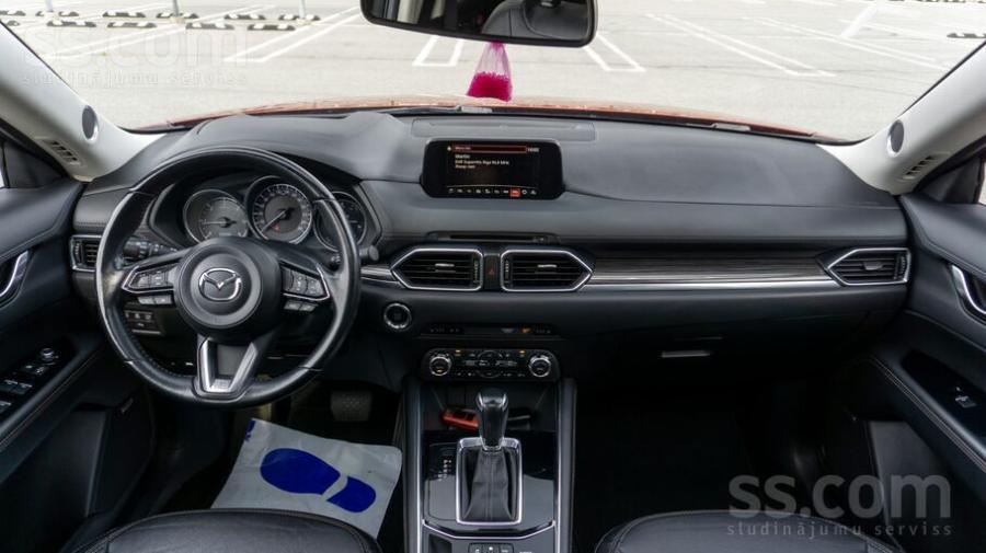 Red Mazda CX-5 2017 in Riga, with an engine capacity of 2.20 L and mileage of 193 thousand km for 15990 €, photo 13 on AUTOMOTO.COM.LV