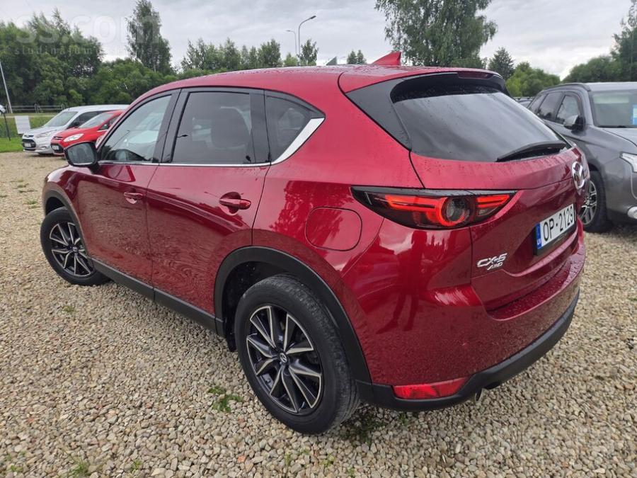 Red Mazda CX-5 2017 in Jelgava, with an engine capacity of 2.50 L and mileage of 0 thousand km for 14800 €, photo 3 on AUTOMOTO.COM.LV