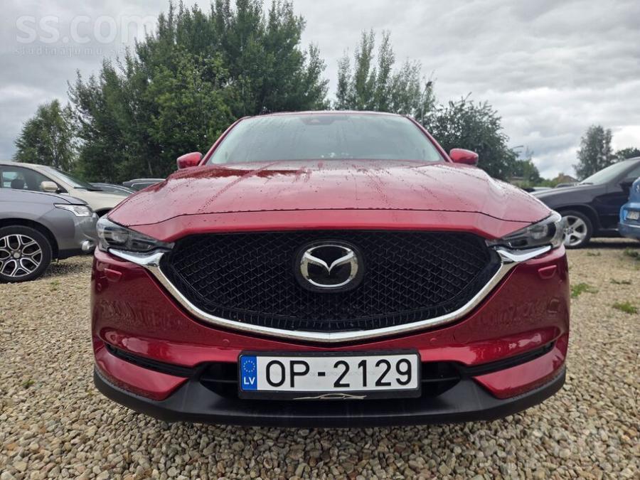 Red Mazda CX-5 2017 in Jelgava, with an engine capacity of 2.50 L and mileage of 0 thousand km for 14800 €, photo 5 on AUTOMOTO.COM.LV