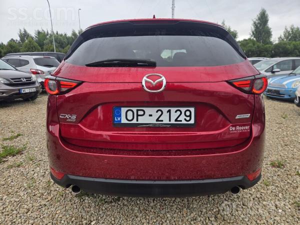 Red Mazda CX-5 2017 in Jelgava, with an engine capacity of 2.50 L and mileage of 0 thousand km for 14800 €, photo 8 on AUTOMOTO.COM.LV