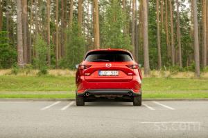 Red Mazda CX-5 2017 in Riga, with an engine capacity of 2.20 L and mileage of 193 thousand km for 14590 €, photo 8 on AUTOMOTO.COM.LV