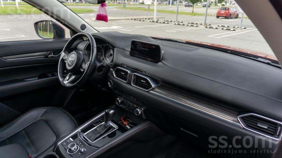 Red Mazda CX-5 2017 in Riga, with an engine capacity of 2.20 L and mileage of 193 thousand km for 14590 €, photo 12 on AUTOMOTO.COM.LV