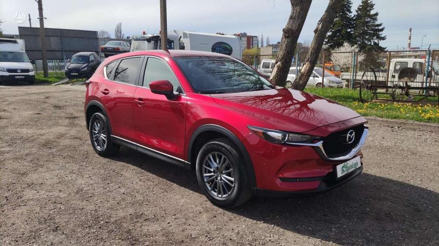 Red Mazda CX-5 2017 in Klaipeda, with an engine capacity of 2.49 L and mileage of 126 thousand km for 14790 €, photo 5 on AUTOMOTO.COM.LV