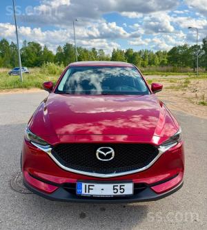 Red Mazda CX-5 2018 in Riga, with an engine capacity of 2.20 L and mileage of 124 thousand km for 18500 €, photo 5 on AUTOMOTO.COM.LV