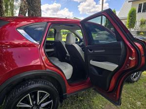 Red Mazda CX-5 2018 in Vilnius, with an engine capacity of 2.20 L and mileage of 190 thousand km for 16500 €, photo 16 on AUTOMOTO.COM.LV