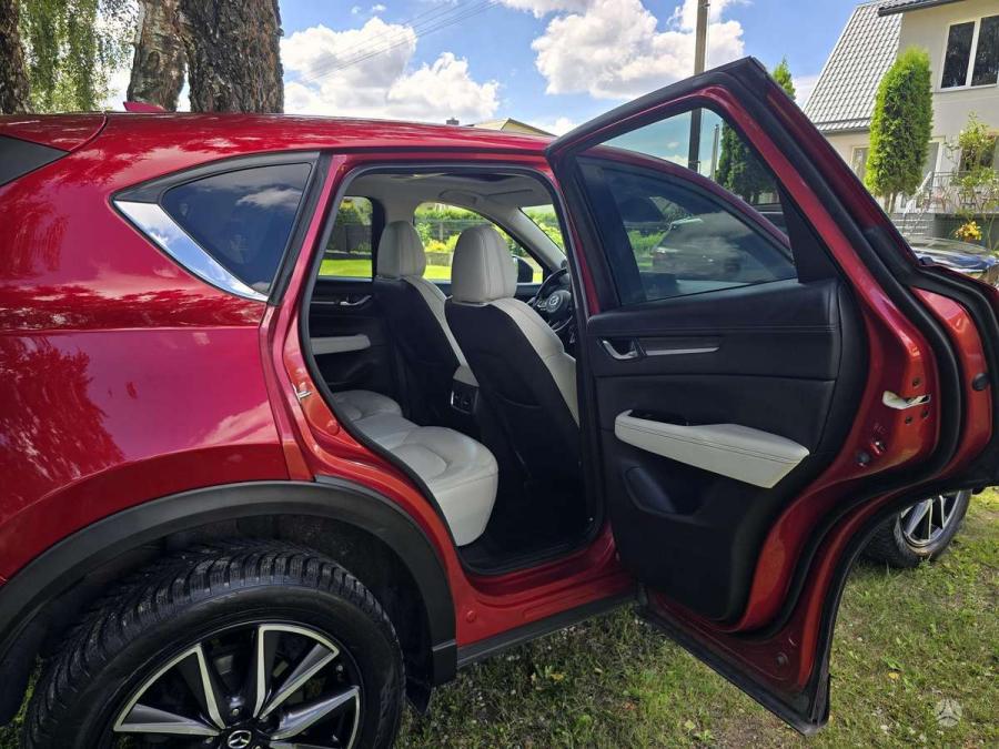 Red Mazda CX-5 2018 in Vilnius, with an engine capacity of 2.20 L and mileage of 190 thousand km for 16500 €, photo 16 on AUTOMOTO.COM.LV