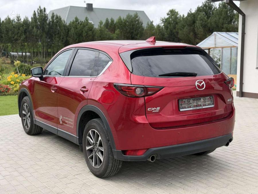 Red Mazda CX-5 2018 in Marijampole, with an engine capacity of 2.19 L and mileage of 300 thousand km for 7400 €, photo 5 on AUTOMOTO.COM.LV