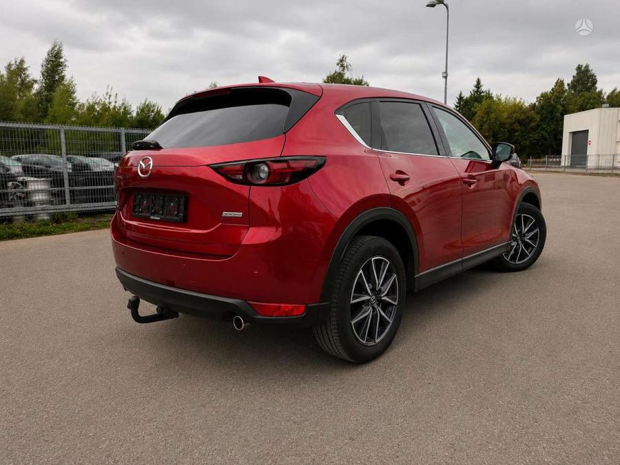 Red Mazda CX-5 2018 in Pakruojis, with an engine capacity of 2.19 L and mileage of 198 thousand km for 12500 €, photo 5 on AUTOMOTO.COM.LV