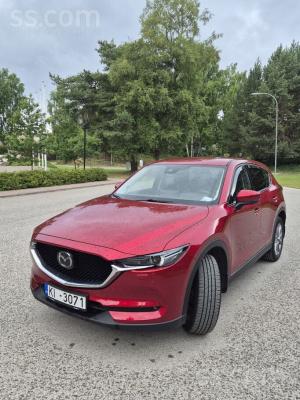 Red Mazda CX-5 2021 in Jurmala, with an engine capacity of 2.00 L and mileage of 61 thousand km for 20500 €, photo 1 on AUTOMOTO.COM.LV