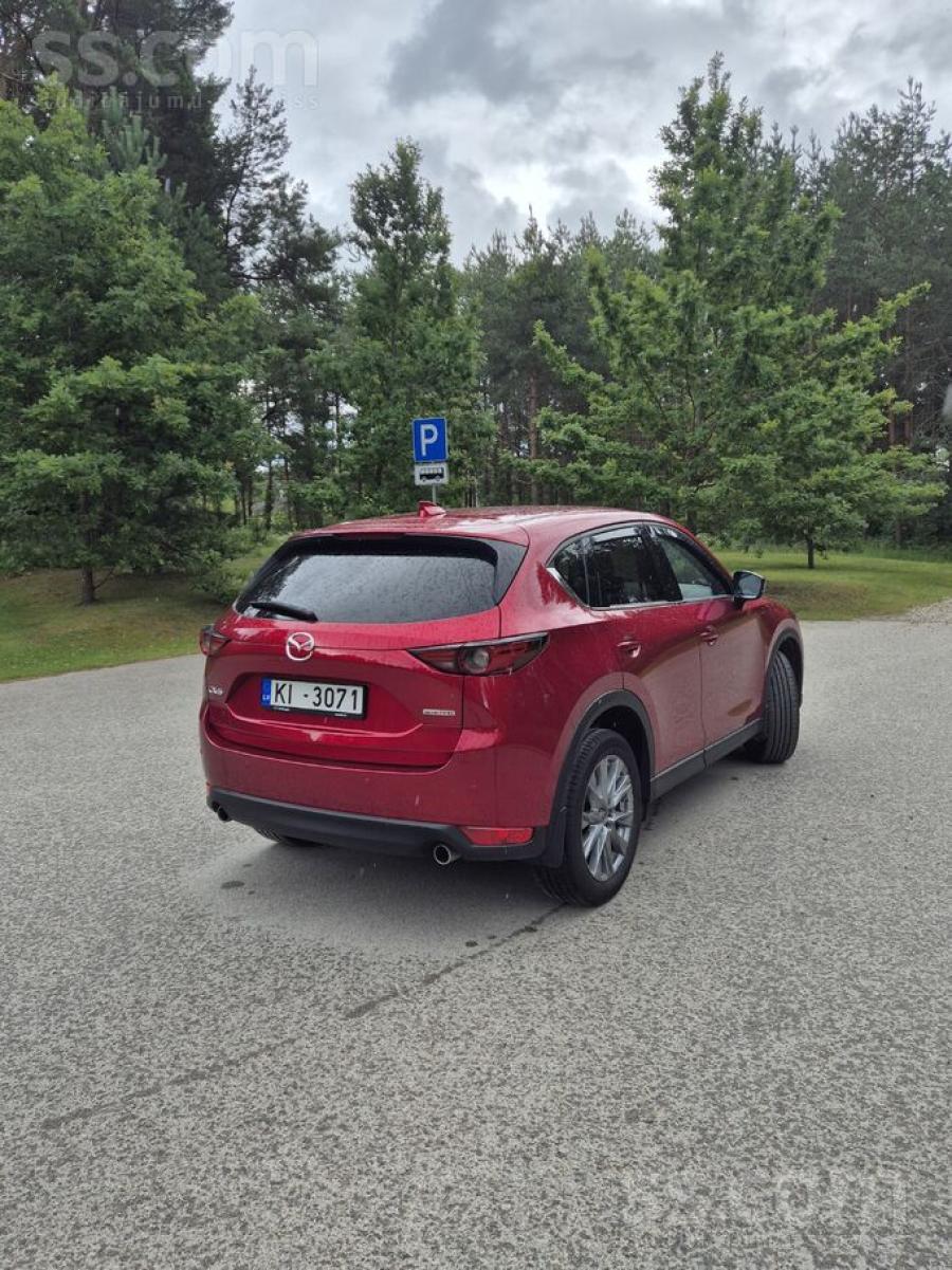Red Mazda CX-5 2021 in Jurmala, with an engine capacity of 2.00 L and mileage of 61 thousand km for 20500 €, photo 4 on AUTOMOTO.COM.LV