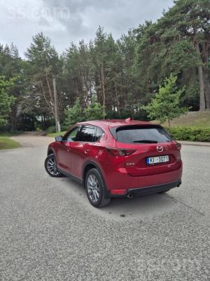 Red Mazda CX-5 2021 in Jurmala, with an engine capacity of 2.00 L and mileage of 61 thousand km for 20500 €, photo 5 on AUTOMOTO.COM.LV