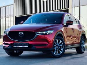 Red Mazda CX-5 2021 in Siauliai, with an engine capacity of 2.00 L and mileage of 228 thousand km for 17650 €, photo  on AUTOMOTO.COM.LV