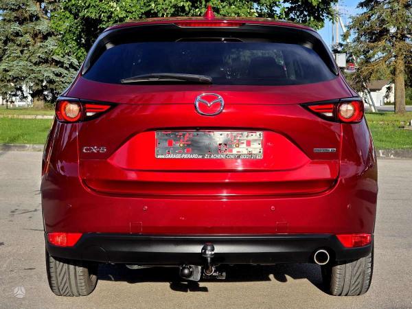 Red Mazda CX-5 2021 in Taurage, with an engine capacity of 2.19 L and mileage of 194 thousand km for 14600 €, photo 6 on AUTOMOTO.COM.LV