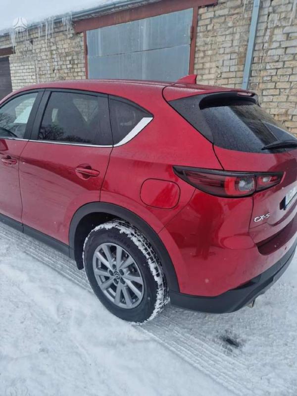Red Mazda CX-5 2022 in Taurage, with an engine capacity of 2.00 L and mileage of 72 thousand km for 21800 €, photo 6 on AUTOMOTO.COM.LV