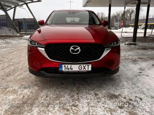 Sarkans Mazda CX-5 2023 Tartu, ar dzinēja tilpumu 2.00 L un nobraukumu 18 tūkst. km par 30000 €, foto  vietnē AUTOMOTO.COM.LV
