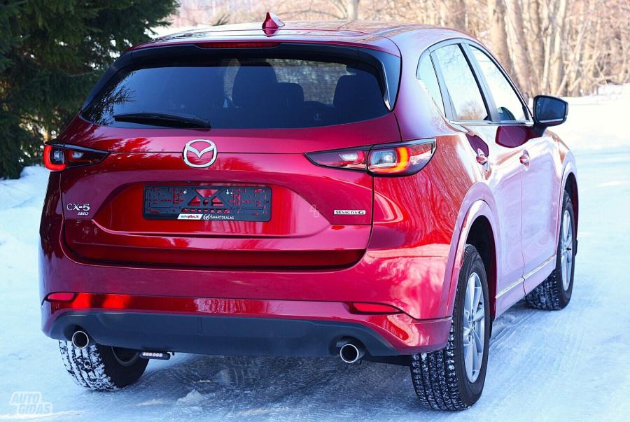 Red Mazda CX-5 2024 in Petrikaiciai, with an engine capacity of 2.50 L and mileage of 28 thousand km for 22999 €, photo 15 on AUTOMOTO.COM.LV