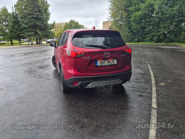 Sarkans Mazda CX-5 2014 Tallina, ar dzinēja tilpumu 2.20 L un nobraukumu 244 tūkst. km par 8500 €, foto 5 vietnē AUTOMOTO.COM.LV