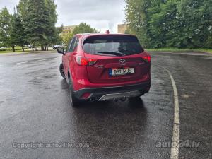 Sarkans Mazda CX-5 2014 Tallina, ar dzinēja tilpumu 2.20 L un nobraukumu 244 tūkst. km par 8500 €, foto 5 vietnē AUTOMOTO.COM.LV