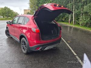 Sarkans Mazda CX-5 2014 Tallina, ar dzinēja tilpumu 2.20 L un nobraukumu 244 tūkst. km par 8500 €, foto 7 vietnē AUTOMOTO.COM.LV