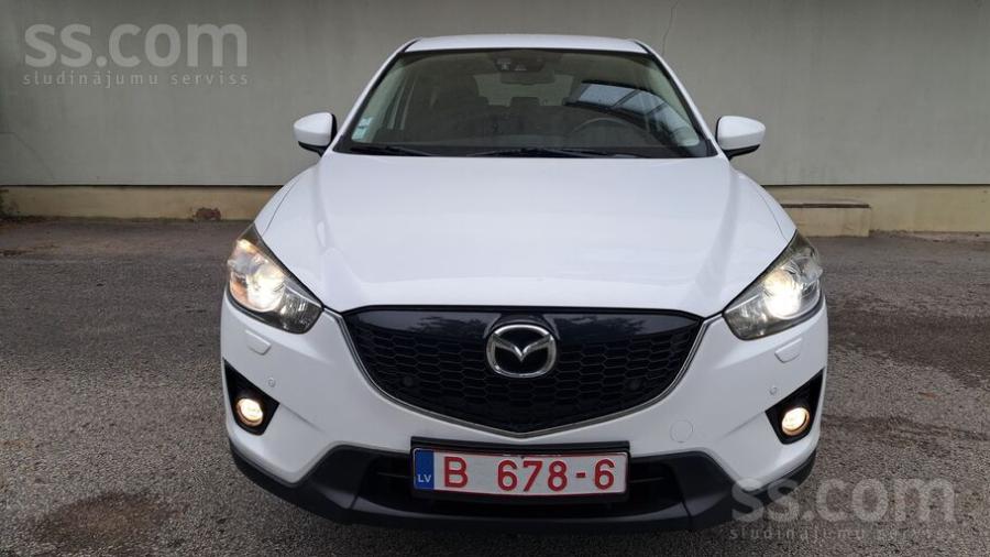 White Mazda CX-5 2012 in Ogre, with an engine capacity of 2.20 L and mileage of 233 thousand km for 6950 €, photo 3 on AUTOMOTO.COM.LV