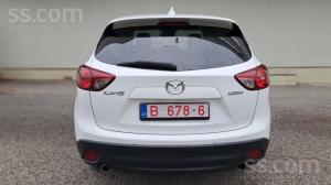 White Mazda CX-5 2012 in Ogre, with an engine capacity of 2.20 L and mileage of 233 thousand km for 6950 €, photo 6 on AUTOMOTO.COM.LV