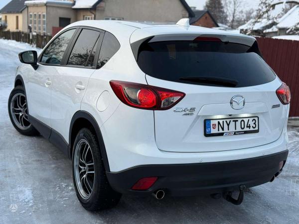 White Mazda CX-5 2012 in Marijampole, with an engine capacity of 2.19 L and mileage of 148 thousand km for 8950 €, photo 4 on AUTOMOTO.COM.LV