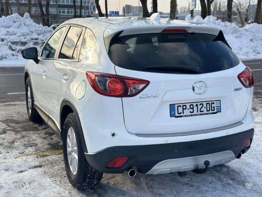 White Mazda CX-5 2012 in Klaipeda, with an engine capacity of 2.19 L and mileage of 221 thousand km for 6999 €, photo 13 on AUTOMOTO.COM.LV