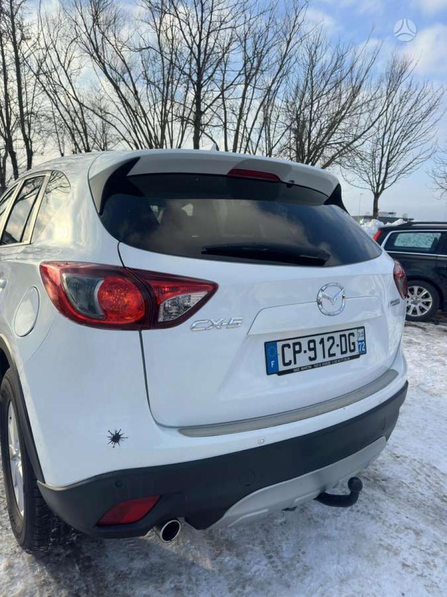 White Mazda CX-5 2012 in Klaipeda, with an engine capacity of 2.19 L and mileage of 221 thousand km for 6999 €, photo 14 on AUTOMOTO.COM.LV