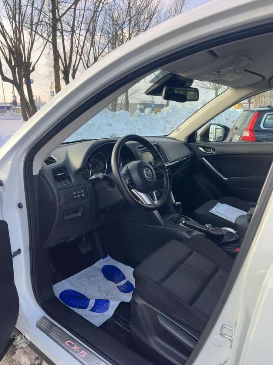 White Mazda CX-5 2012 in Klaipeda, with an engine capacity of 2.19 L and mileage of 221 thousand km for 6999 €, photo 16 on AUTOMOTO.COM.LV