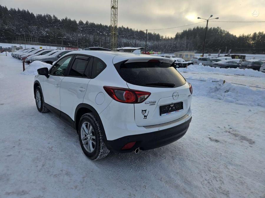 White Mazda CX-5 2012 in Vilnius, with an engine capacity of 2.19 L and mileage of 232 thousand km for 6950 €, photo 3 on AUTOMOTO.COM.LV