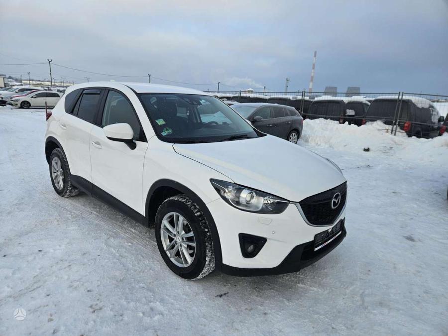 White Mazda CX-5 2012 in Vilnius, with an engine capacity of 2.19 L and mileage of 232 thousand km for 6950 €, photo 6 on AUTOMOTO.COM.LV
