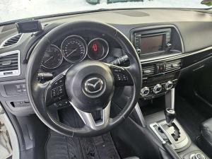 White Mazda CX-5 2012 in Vilnius, with an engine capacity of 2.19 L and mileage of 232 thousand km for 6950 €, photo 11 on AUTOMOTO.COM.LV