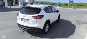 White Mazda CX-5 2012 in Gargzdai, with an engine capacity of 2.20 L and mileage of 203 thousand km for 6900 €, photo 4 on AUTOMOTO.COM.LV