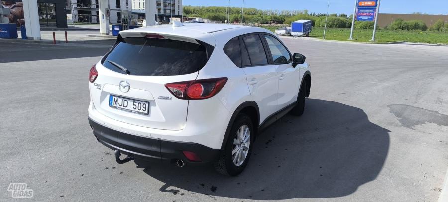 White Mazda CX-5 2012 in Gargzdai, with an engine capacity of 2.20 L and mileage of 203 thousand km for 6900 €, photo 4 on AUTOMOTO.COM.LV