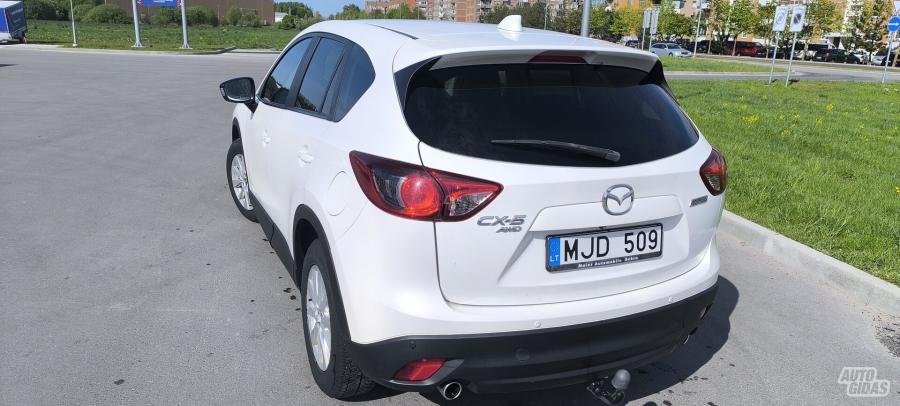 White Mazda CX-5 2012 in Gargzdai, with an engine capacity of 2.20 L and mileage of 203 thousand km for 6900 €, photo 6 on AUTOMOTO.COM.LV