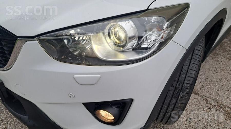 Balts Mazda CX-5 2012 Ogre, ar dzinēja tilpumu 2.20 L un nobraukumu 233 tūkst. km par 6150 €, foto 25 vietnē AUTOMOTO.COM.LV