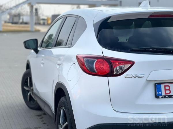White Mazda CX-5 2012 in Rezekne, with an engine capacity of 2.20 L and mileage of 0 thousand km for 6700 €, photo 8 on AUTOMOTO.COM.LV