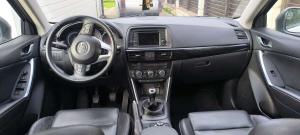 White Mazda CX-5 2012 in Gargzdai, with an engine capacity of 2.19 L and mileage of 204 thousand km for 7000 €, photo 9 on AUTOMOTO.COM.LV