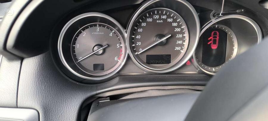 White Mazda CX-5 2012 in Gargzdai, with an engine capacity of 2.19 L and mileage of 204 thousand km for 7000 €, photo 14 on AUTOMOTO.COM.LV