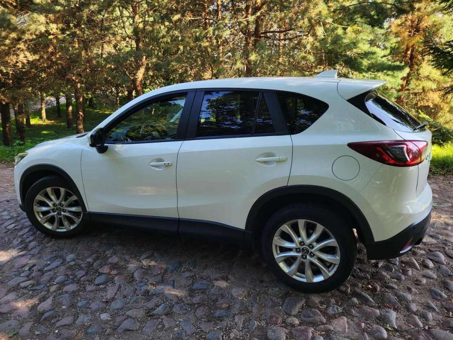 White Mazda CX-5 2012 in Kaunas, with an engine capacity of 2.19 L and mileage of 229 thousand km for 5300 €, photo 4 on AUTOMOTO.COM.LV