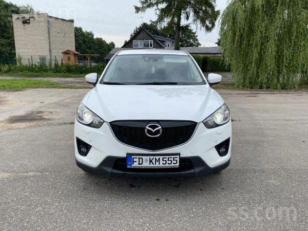 Mazda CX-5 2012 Ogre vietnē Balts Mazda CX-5 2012 Ogre, ar dzinēja tilpumu 2.20 L un nobraukumu 168 tūkst. km par 6690 €, foto 3 vietnē AUTOMOTO.COM.LV
