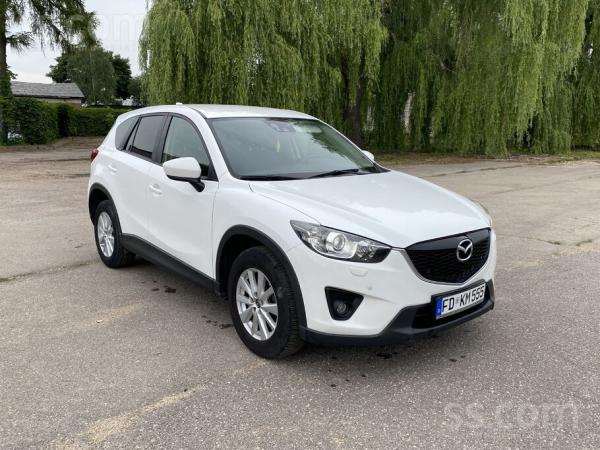 Mazda CX-5 2012 Ogre vietnē Balts Mazda CX-5 2012 Ogre, ar dzinēja tilpumu 2.20 L un nobraukumu 168 tūkst. km par 6690 €, foto 4 vietnē AUTOMOTO.COM.LV
