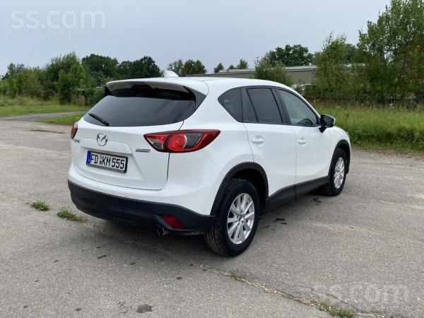 Mazda CX-5 2012 Ogre vietnē Balts Mazda CX-5 2012 Ogre, ar dzinēja tilpumu 2.20 L un nobraukumu 168 tūkst. km par 6690 €, foto 7 vietnē AUTOMOTO.COM.LV
