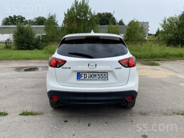 Mazda CX-5 2012 Ogre vietnē Balts Mazda CX-5 2012 Ogre, ar dzinēja tilpumu 2.20 L un nobraukumu 168 tūkst. km par 6690 €, foto 8 vietnē AUTOMOTO.COM.LV