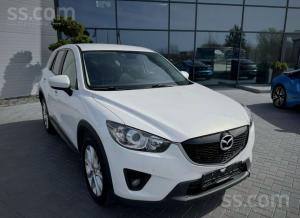 White Mazda CX-5 2013 in Vilnius, with an engine capacity of 2.20 L and mileage of 189 thousand km for 6499 €, photo 1 on AUTOMOTO.COM.LV