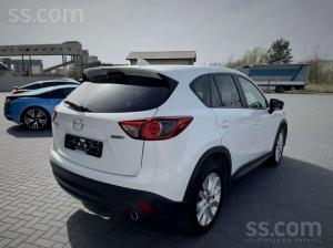 White Mazda CX-5 2013 in Vilnius, with an engine capacity of 2.20 L and mileage of 189 thousand km for 6499 €, photo 4 on AUTOMOTO.COM.LV