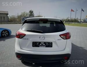 White Mazda CX-5 2013 in Vilnius, with an engine capacity of 2.20 L and mileage of 189 thousand km for 6499 €, photo 5 on AUTOMOTO.COM.LV