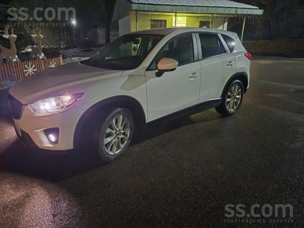 White Mazda CX-5 2013 in Liepaja, with an engine capacity of 2.20 L and mileage of 203 thousand km for 6150 €, photo 5 on AUTOMOTO.COM.LV